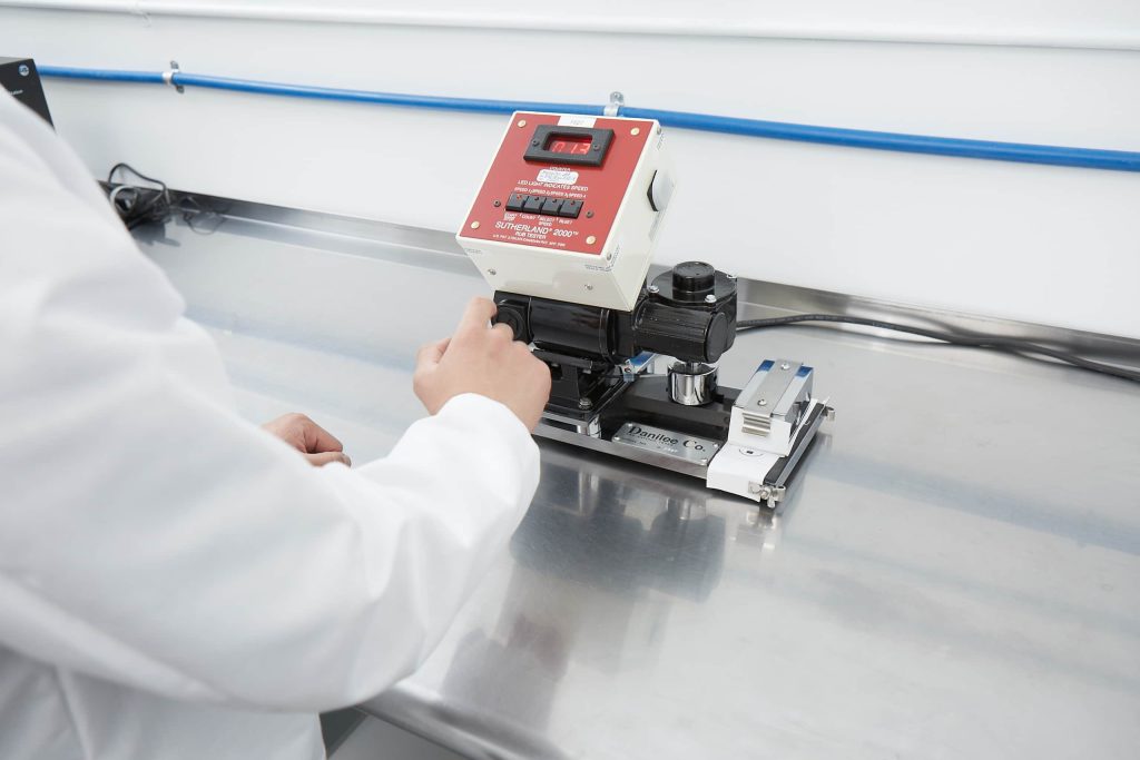 The Sutherland Rub Test - ASTM D5264 | Packagnig Compliance Labs